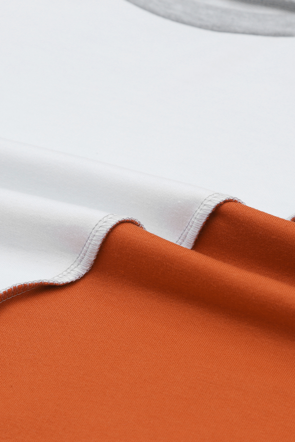 $ 6.1 - Wholesale Khaki Colorblock Stitching Irregular Hem Long Sleeve Top