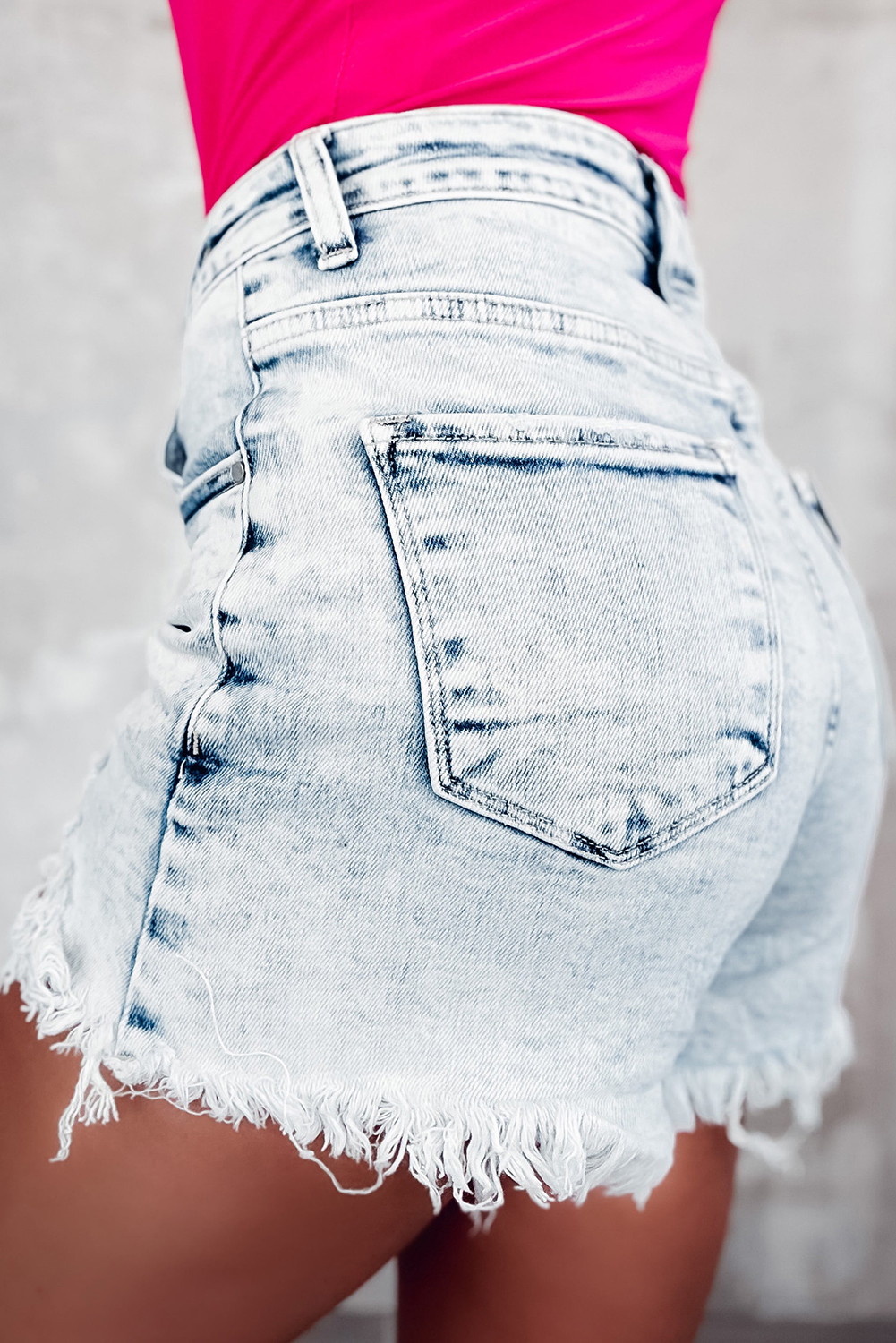 $9.84 Light Blue Acid Wash Crossed Raw Edge Denim Shorts Wholesale