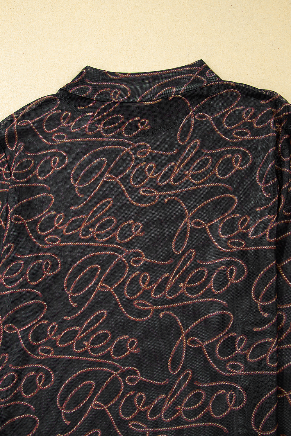 $3.1 Black Western Rodeo Printed Mock Neck Long Sleeve Mesh Top Wholesale