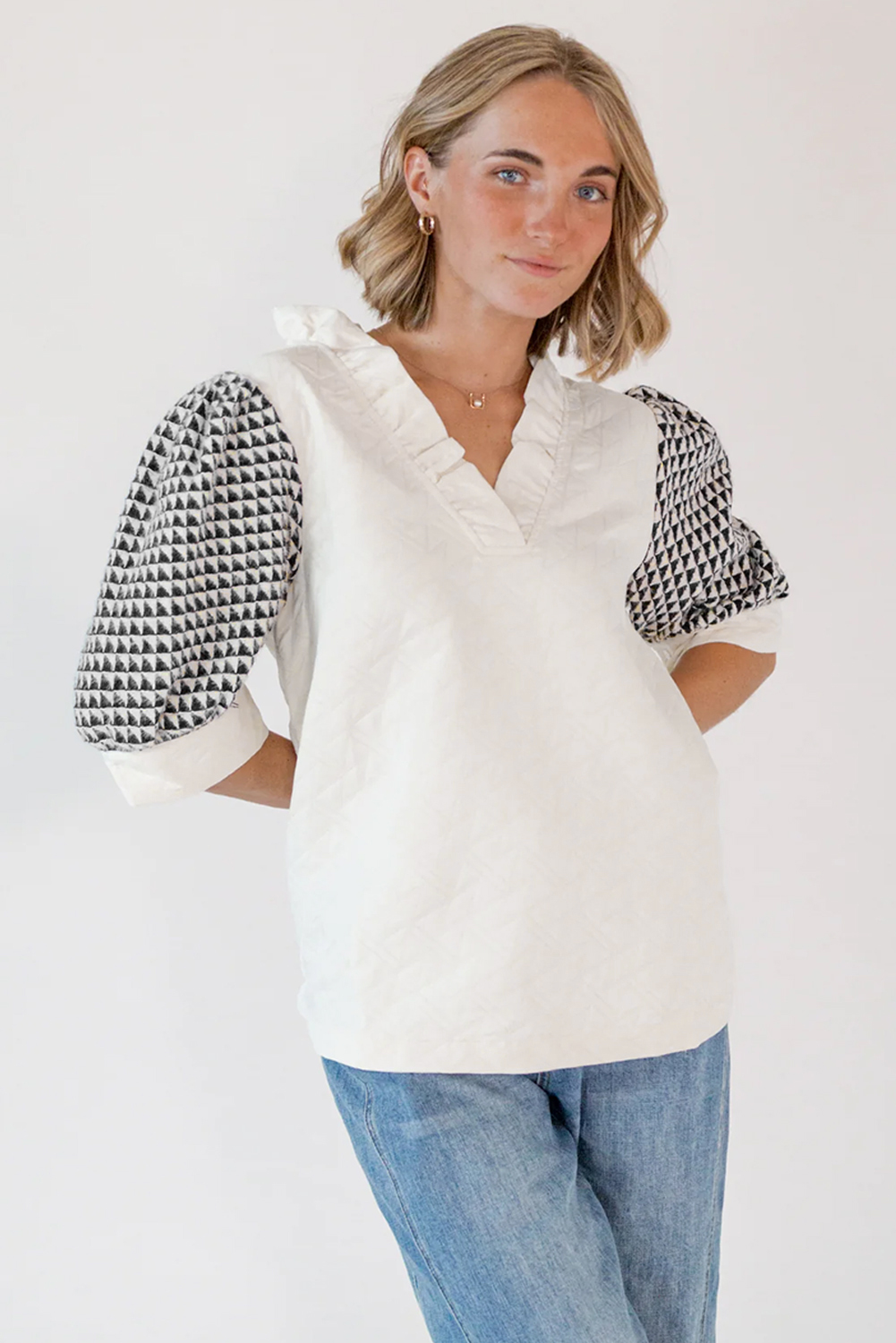 $6.35 White Geometric Textured Short Sleeve Frilly V Neck Blouse Wholesale
