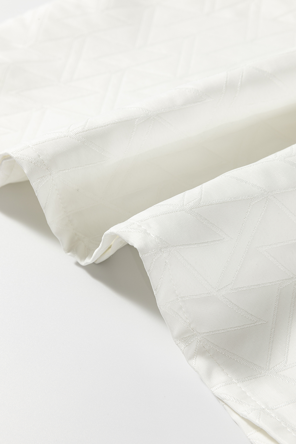 $6.35 White Geometric Textured Short Sleeve Frilly V Neck Blouse Wholesale