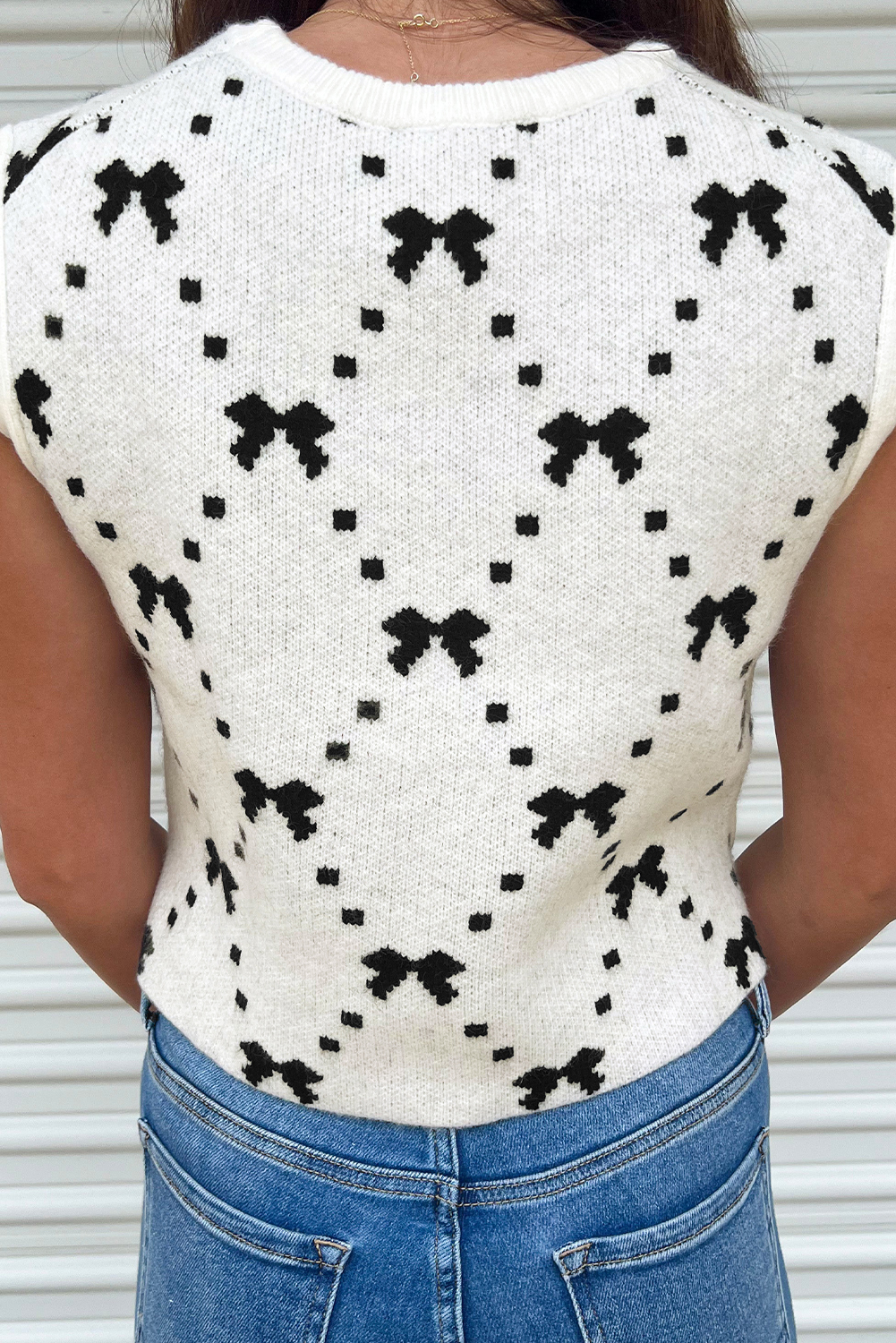 $8 White Bow Pattern Buttoned Side Cropped Sweater Vest Wholesale