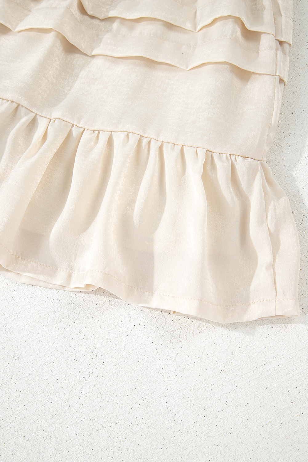 $4.95 Beige Tiered Ruffled Hemline Elastic Waist Mini Skirt Wholesale