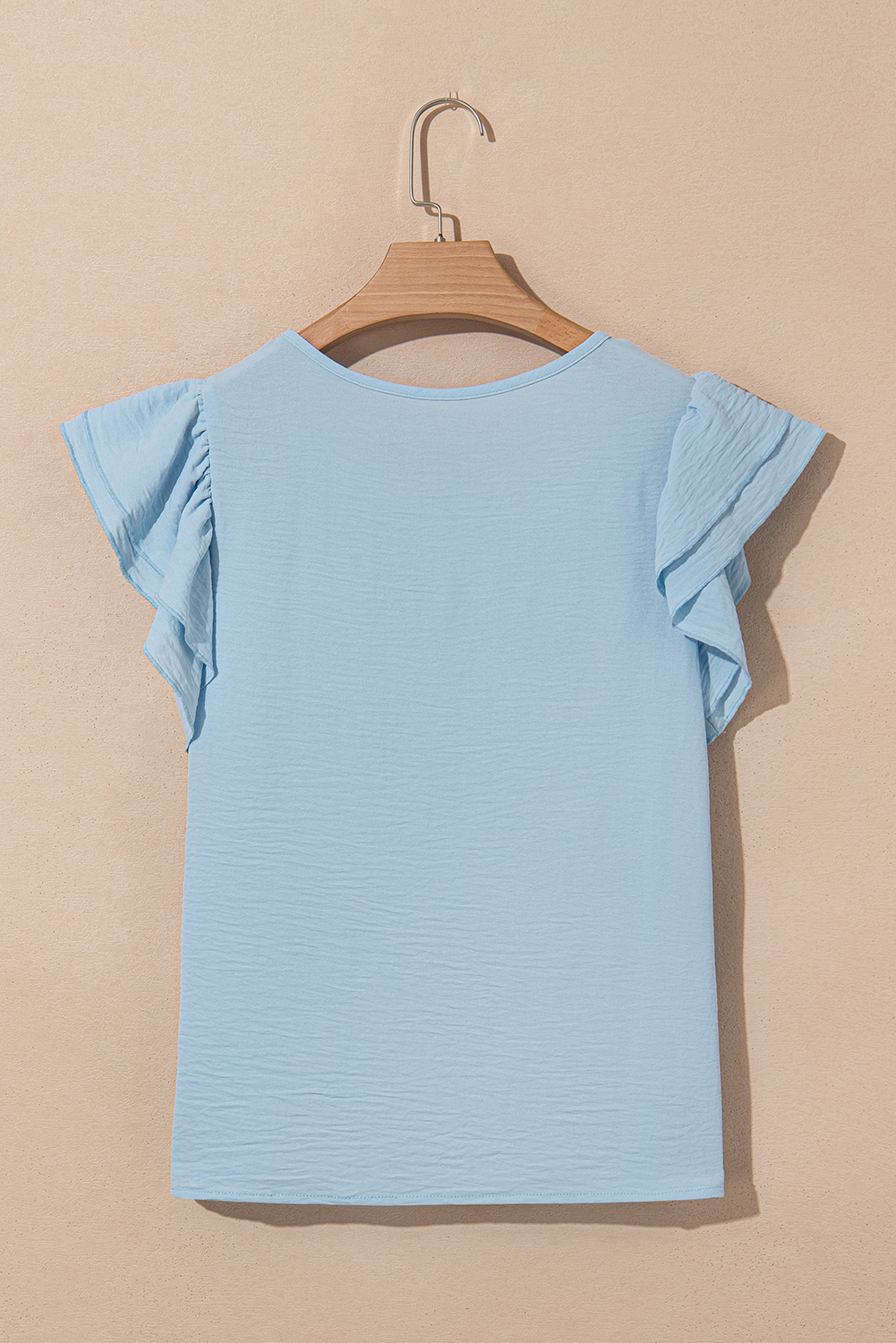 $4 Mist Blue Solid Color Ruffled Short Sleeve Casual Blouse Wholesale