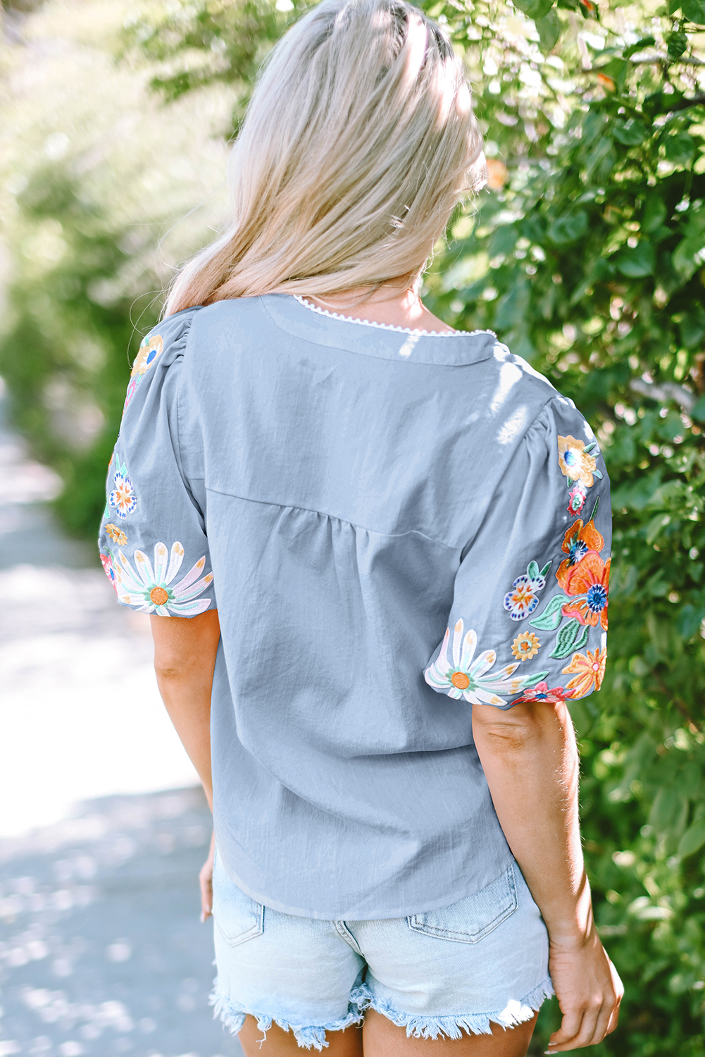 $11.2 Beau Blue Floral Embroidered Puff Sleeve Split Neck Blouse Wholesale